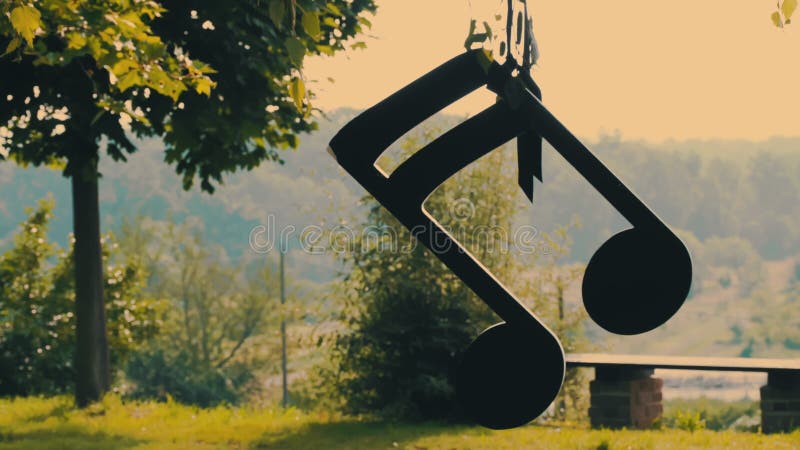 Wedding Decor. Musical Decorative Note Hanging from a Tree Stock ...