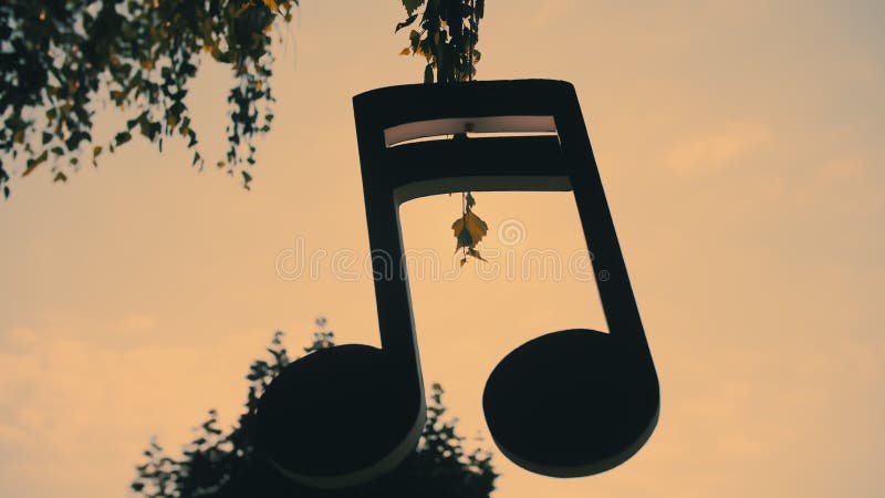 Wedding Decor. Musical Decorative Note Hanging from a Tree Stock Video ...