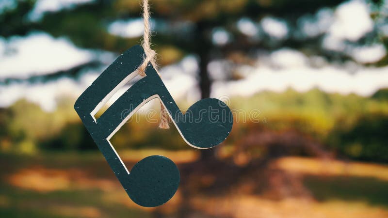 Wedding Decor. Musical Decorative Note Hanging from a Tree Stock Video ...