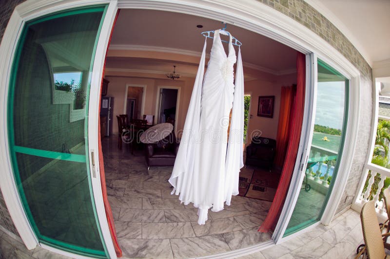 Wedding Dress at the Hotel on the Background of the Pool, Ocean and ...