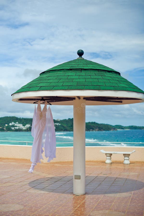 Wedding Dress at the Hotel on the Background of the Pool, Ocean and ...