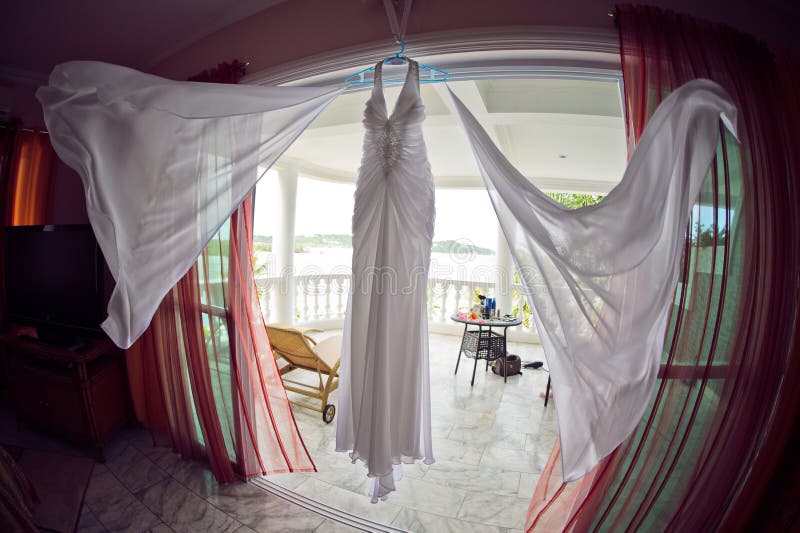 Wedding Dress at the Hotel on the Background of the Pool, Ocean and ...