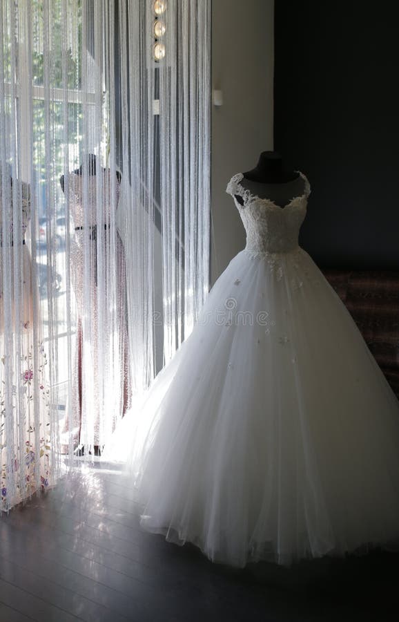 Wedding Dresses on Mannequins in Front of the Window Stock Image ...