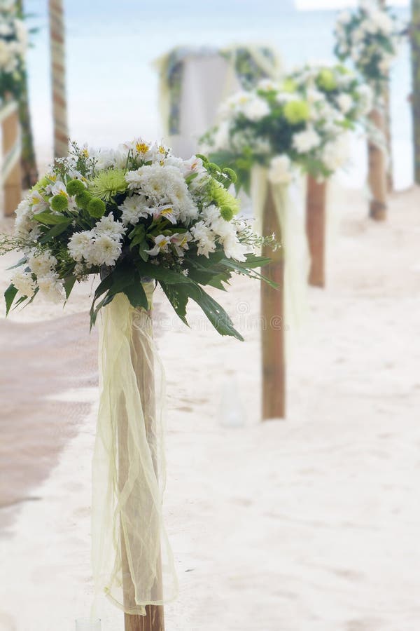 Wedding Flower Post on Beach Stock Photo - Image of floral, arch: 31112444