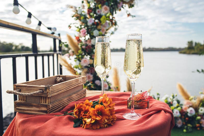 Wedding Glasses with Champagne on the Table for the Ceremony. Stock ...