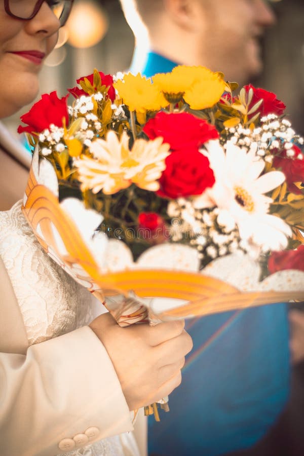 Wedding Guest Holding a Beautiful Bouquet of Flowers Stock Image ...