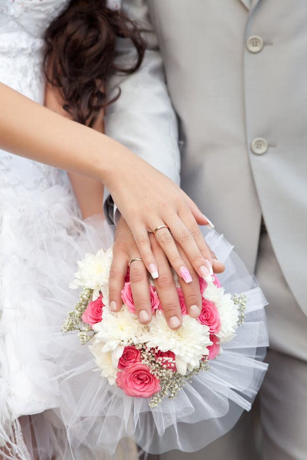 Wedding hands stock photo. Image of bouquet, lifestyles - 27299364