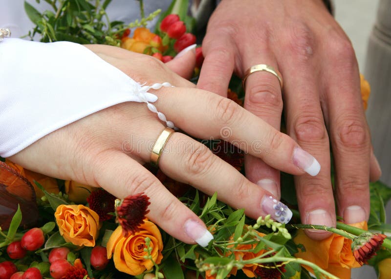 Wedding hands stock image. Image of husband, hand, bouquet - 399011