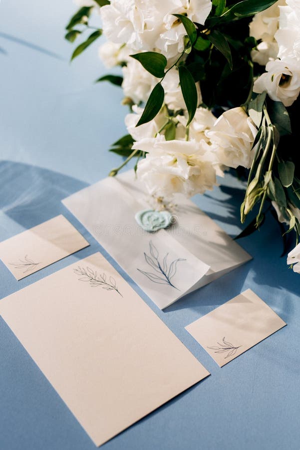 Wedding Invitation in a Blue Envelope on a Table Stock Photo - Image of ...