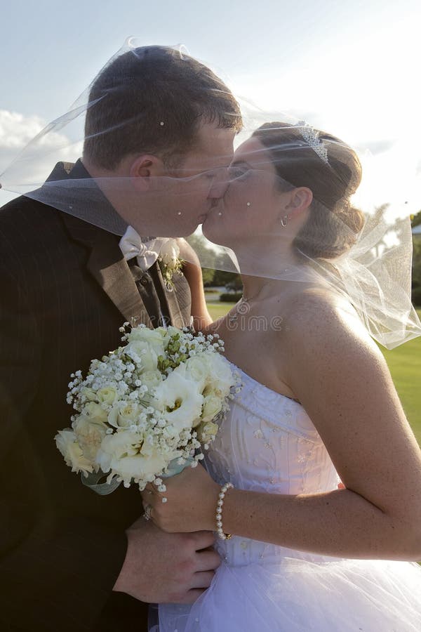Wedding couple kissing stock image. Image of happiness - 11004543