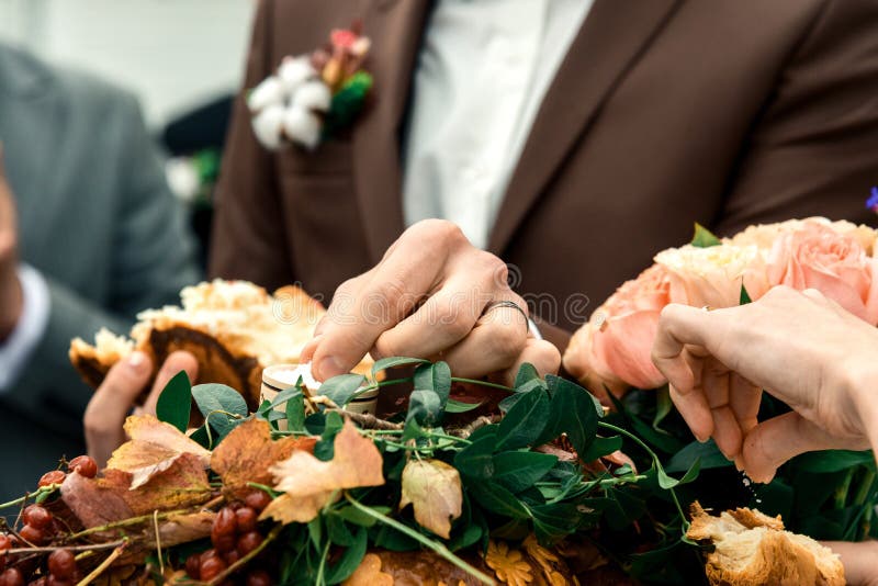 Wedding Loaf Being Broken by Bride and Groom Stock Image - Image of ...