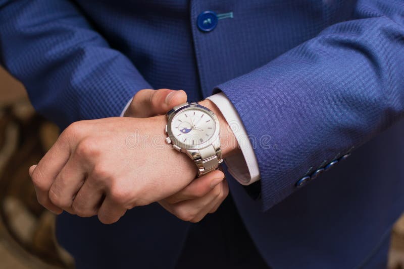 Wedding Photo. the Groom Puts on Hours Stock Image - Image of manager ...