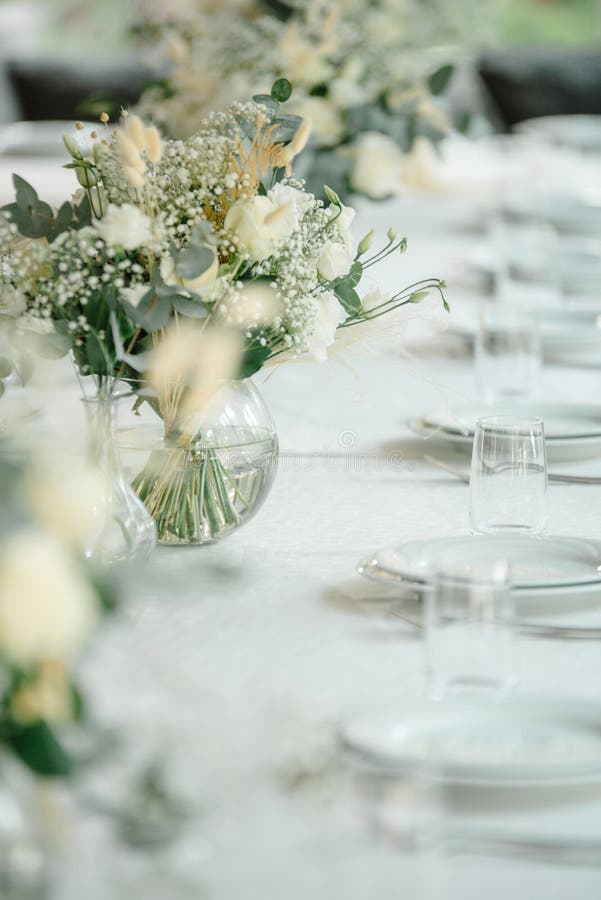 Wedding Reception Table in the Restaurant Decorated with White Candles ...