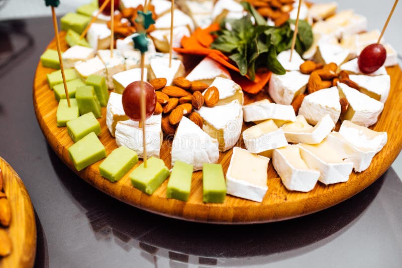 Tasting Cheese Dish . Delicious Cheese on the Table. Table Setting at a ...