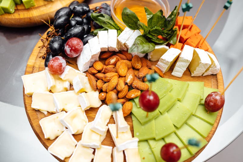 Tasting Cheese Dish . Delicious Cheese on the Table. Table Setting at a ...