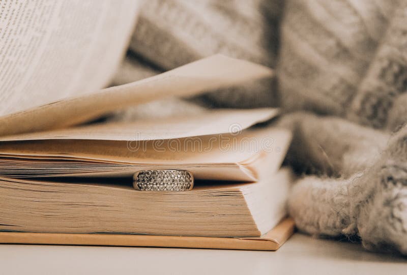 Wedding Ring in the Book Pages Jewelry Stock Image - Image of isolated ...