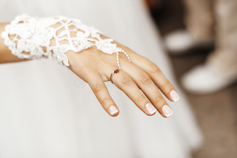 Wedding Ring on Bridal Hand Stock Photo - Image of marriage, gold: 70632946