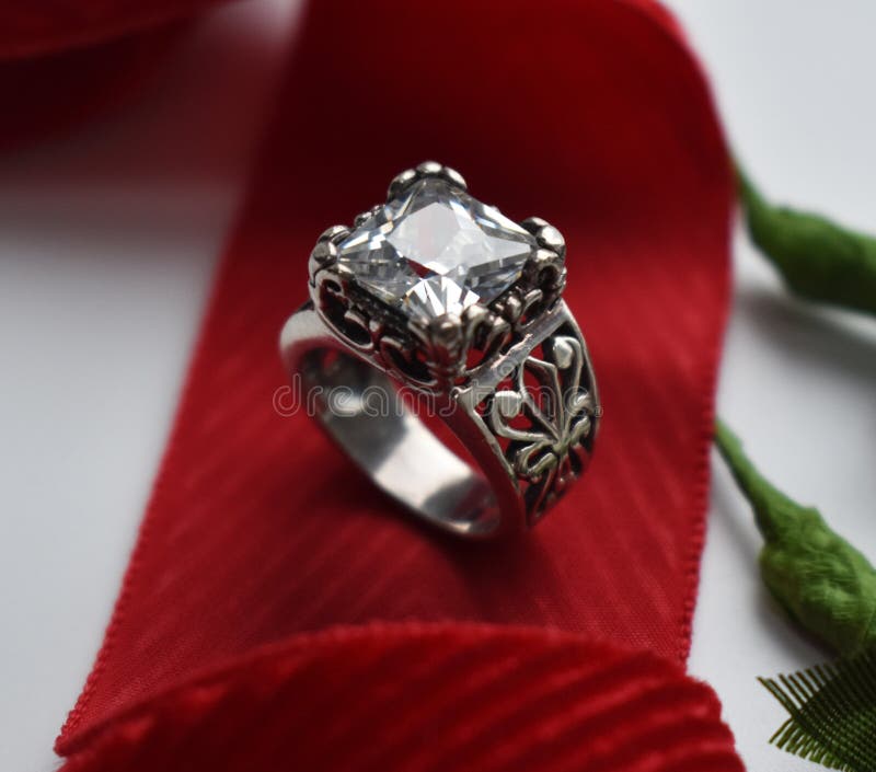 Wedding Ring with a Diamond on a Red Satin Ribbon Stock Photo - Image ...