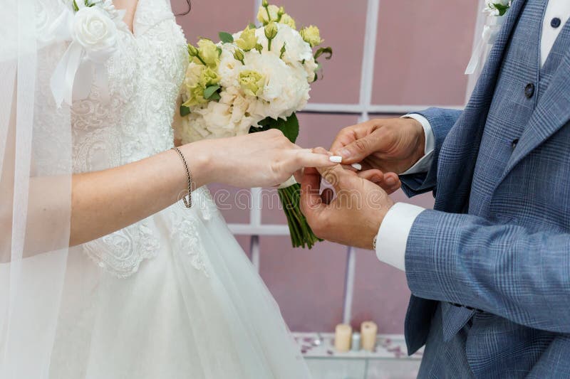 Wedding Ring Exchange during Ceremony Stock Image - Image of commitment ...