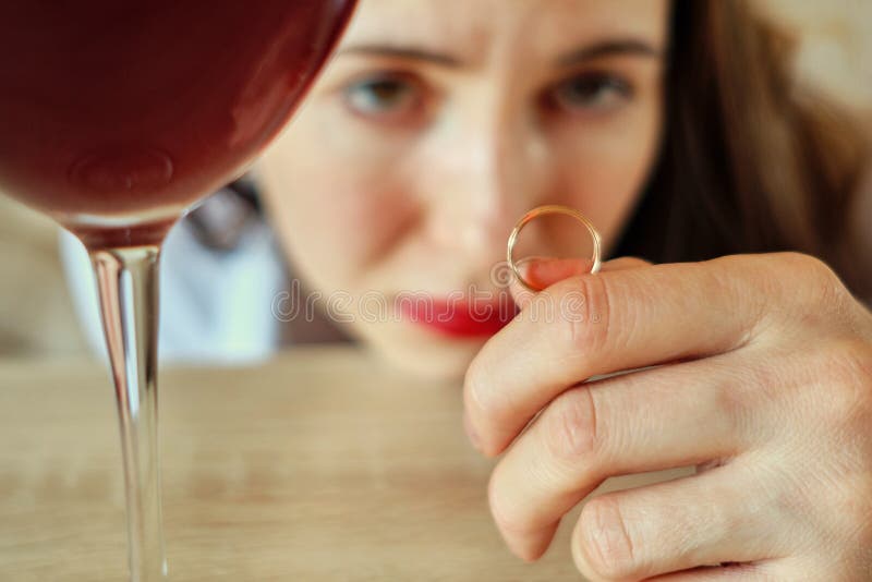 Wedding Ring in a Girl`s Hand with a Glass of Wine Stock Image - Image ...