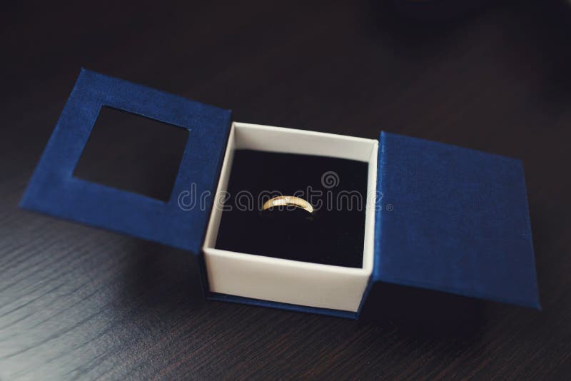 Wedding Ring Lies in a Simple Blue Box Stock Photo - Image of accessory ...