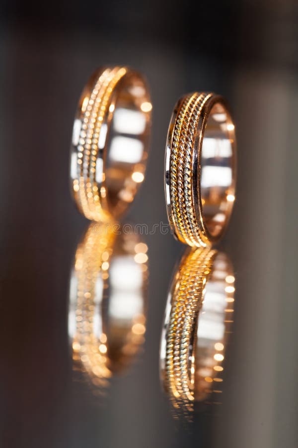 Wedding ring on a mirror stock photo. Image of bride - 69414358