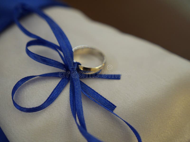 Wedding ring with ribbon stock photo. Image of luxury - 152965762