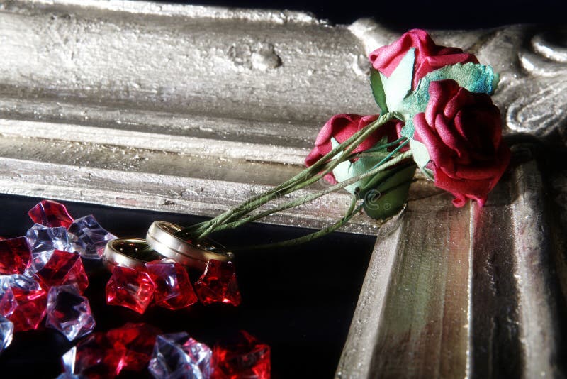 Wedding rings stock image. Image of flowers, photograph - 14877111