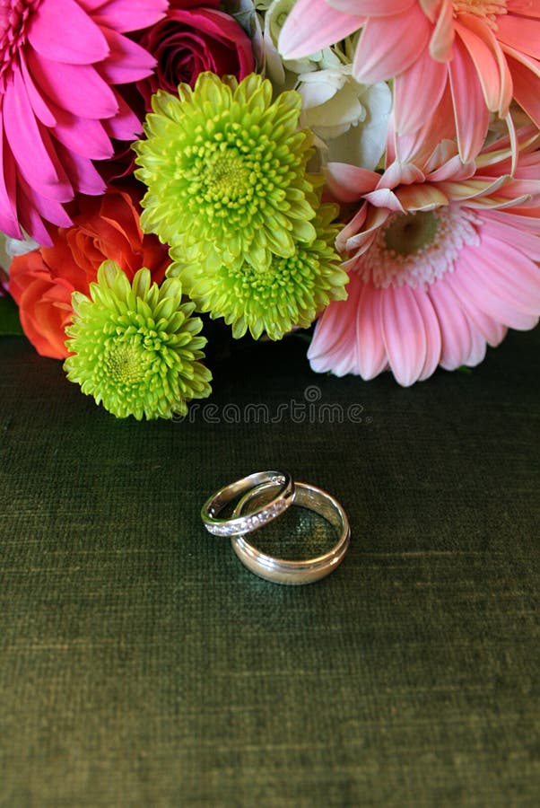 Bride and Groom Hands stock photo. Image of bouquet, roses - 12491854