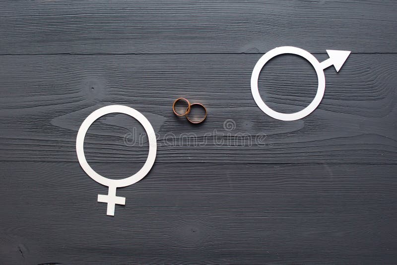 Wedding Rings On The Beautiful Hardwood Background The Concept Of