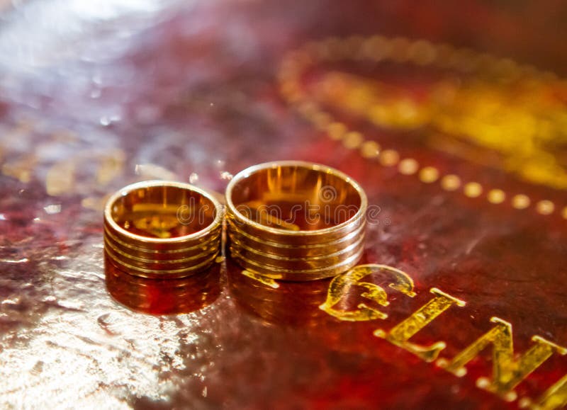 Wedding Rings on Bible, on Church Altar Stock Photo - Image of husband ...
