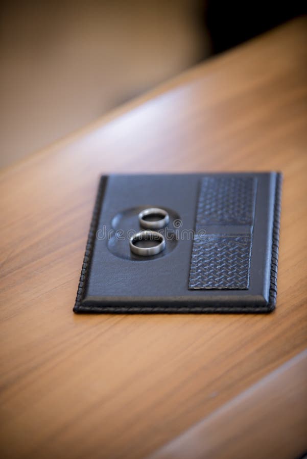 Wedding Rings on Board Presented Stock Image - Image of finance, rings ...