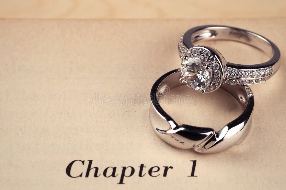 Wedding rings on book stock photo. Image of beauty, bridal - 67508134