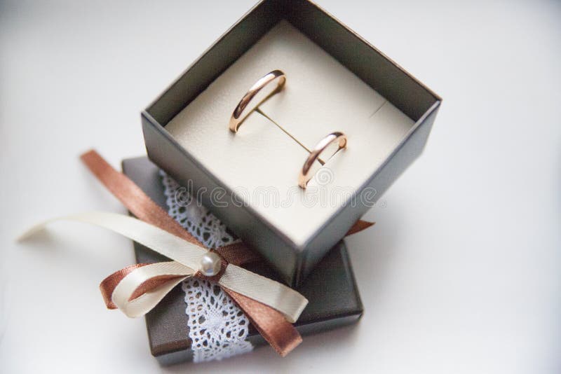 Wedding rings in a box stock photo. Image of diamond - 84267604