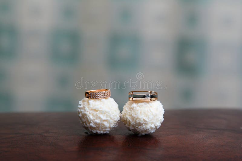 Wedding Rings on Candy Raffaello Stock Photo - Image of celebration ...
