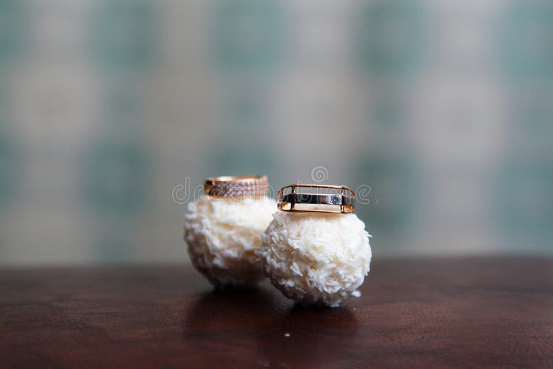 Wedding Rings on Candy Raffaello Stock Image - Image of elegant ...
