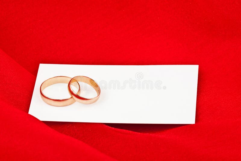 Wedding Rings with Card on Red Fabric Stock Photo - Image of marriage ...