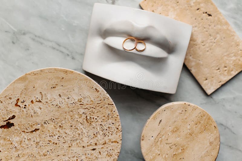 Wedding Rings on Gypsum Texture on the Stone Table. Stock Image - Image ...