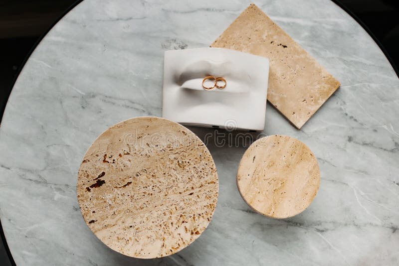 Wedding Rings on Gypsum Texture on the Stone Table. Stock Image - Image ...