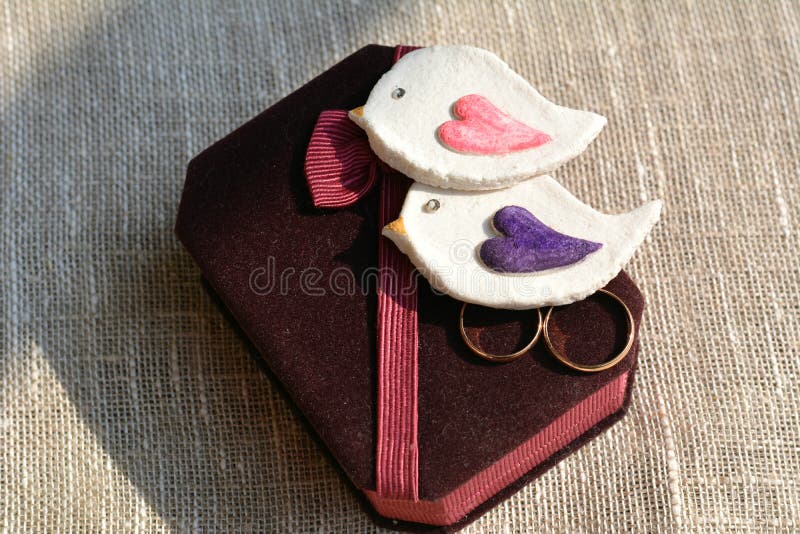 Wedding Rings and Decorative Birds Stock Photo - Image of birds, decor ...