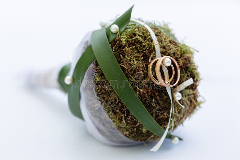 Wedding Rings on a Decorative Moss Ball Stock Photo - Image of wedding ...