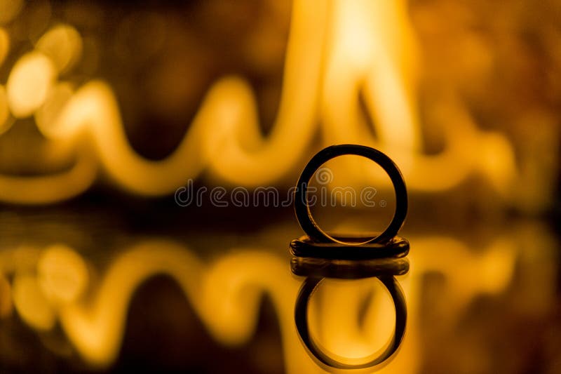 Wedding Rings with Fire Background. Stock Image - Image of empty ...