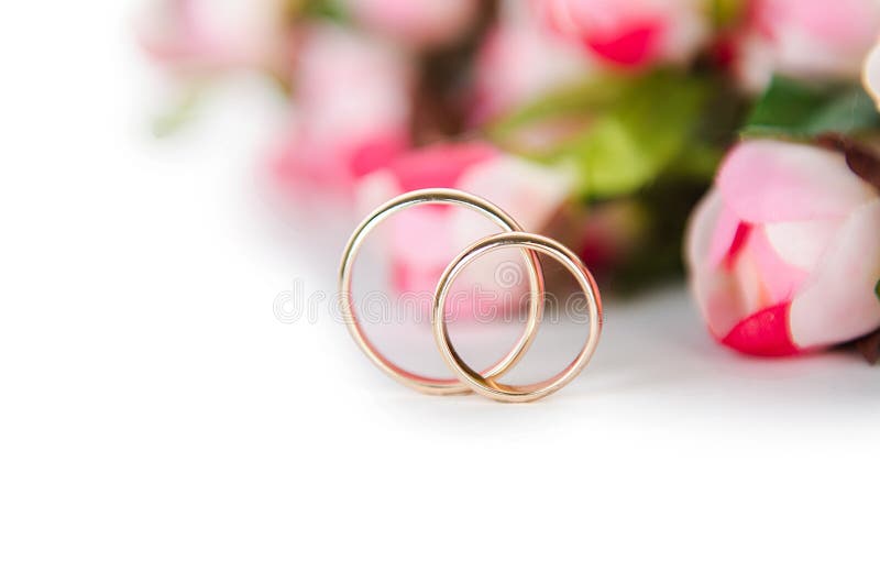 The Wedding Rings And Flowers Isolated On White Background Stock Image ...