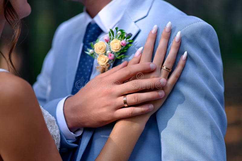 Wedding rings on hands stock image. Image of lifestyle - 262245609