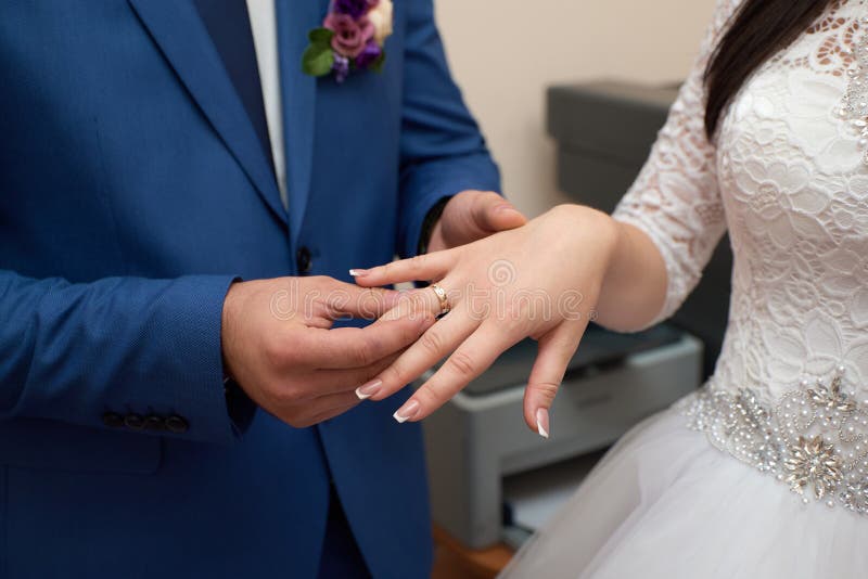 Wedding rings on hands stock photo. Image of anniversary - 262245618