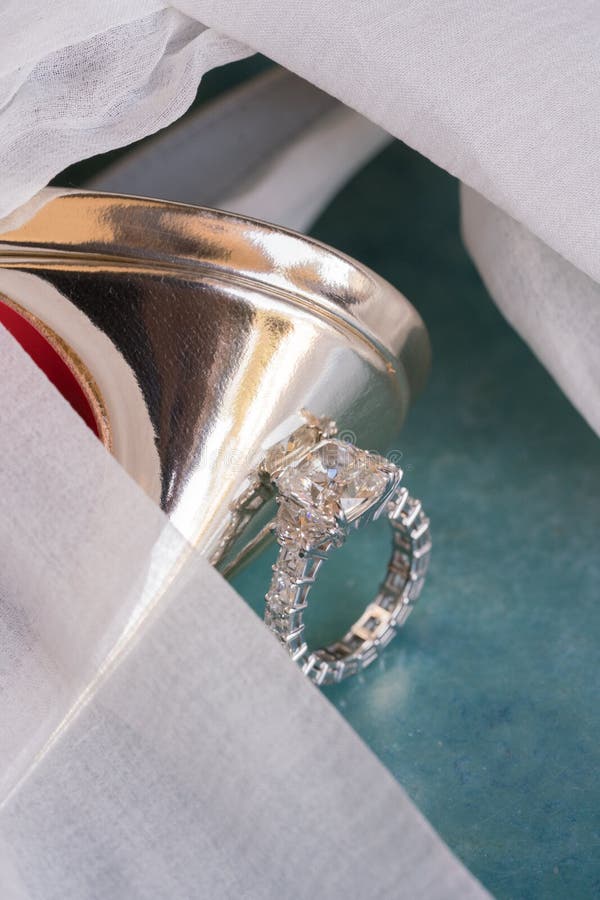 Wedding Rings and High White with Stones Heel Stock Image - Image of ...