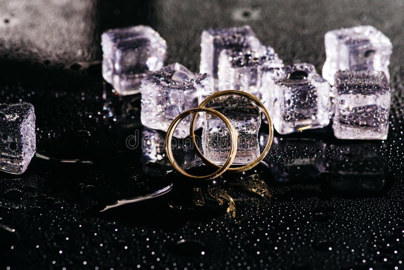 Wedding Rings and Ice Cubes. Background for Greeting Card or Invitation ...