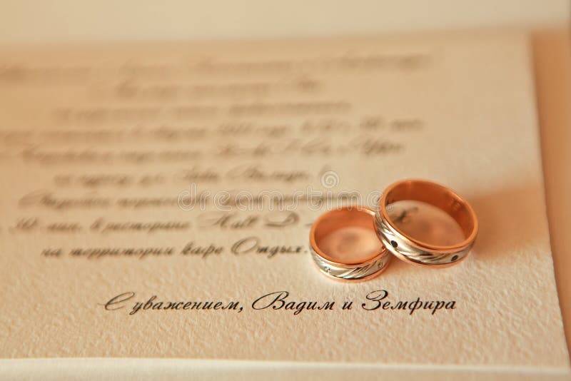 Wedding Rings on the Invitation Stock Image - Image of rings, tradition ...