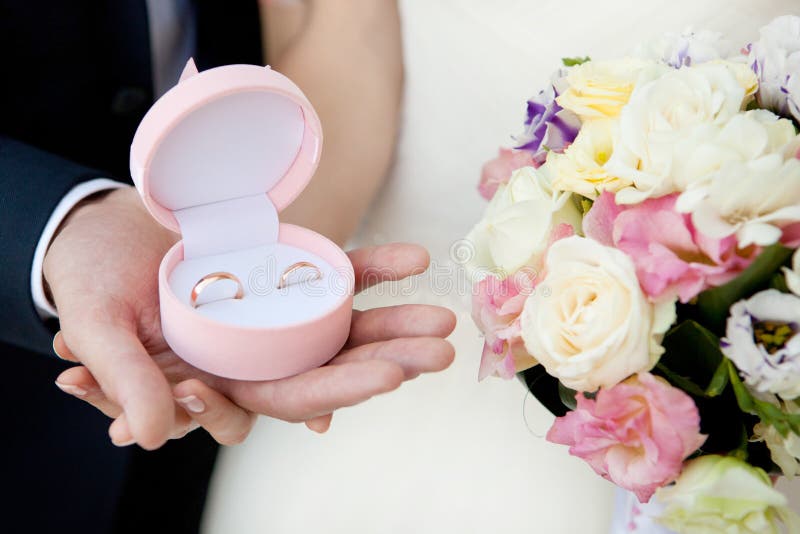 Wedding rings stock photo. Image of bouquet, adult, male - 49957098