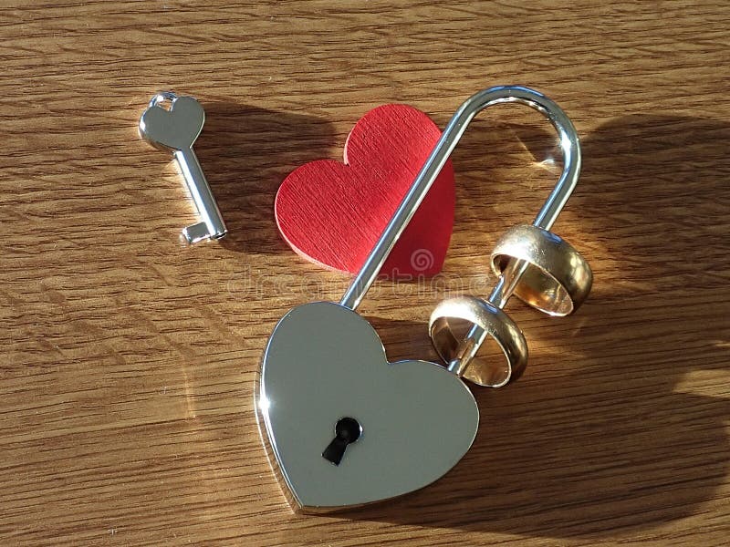 Wedding Rings, Key, Lock and Red Heart Stock Photo - Image of golden ...